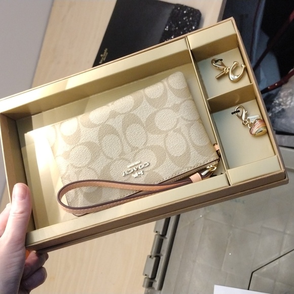 Bags | Coach Wristlet With Charms New In Box | Poshmark
